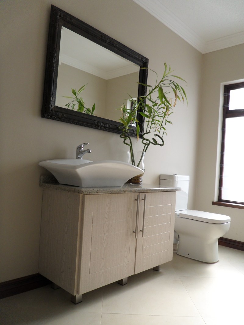 Shale-oak-PVC-vanity-with-a-horizontal-tongue-and-groove-door-pattern ...